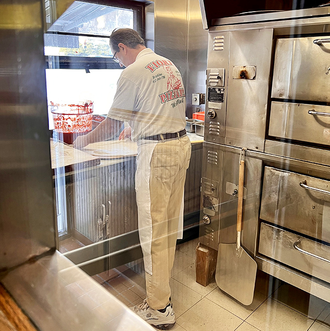 Behind every great pizza is someone who knows exactly how long "just another minute" really means. Watching dough become art is its own kind of entertainment.