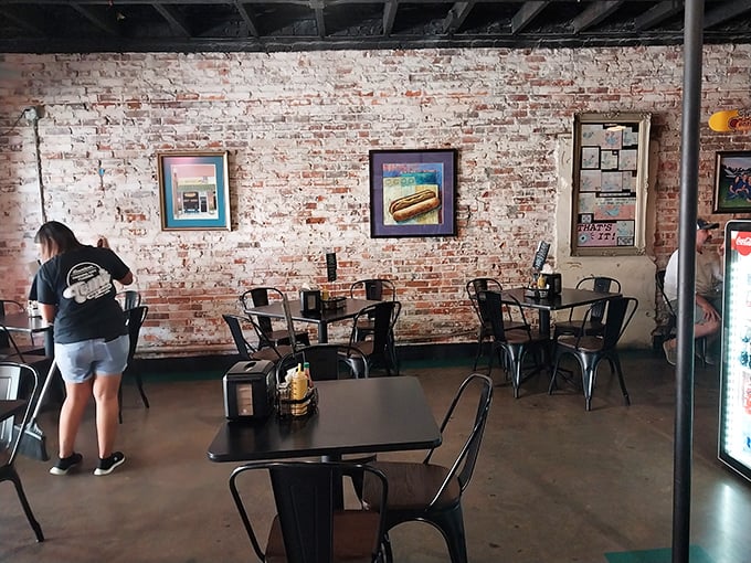 The dining room's industrial-meets-homey vibe creates that perfect "third place" between work and home where conversations flow as easily as the sweet tea.