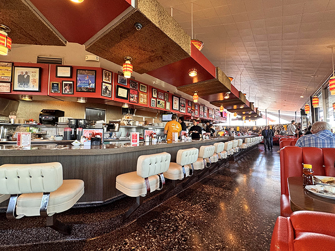 The counter stretches like a runway of possibility, where regulars and first-timers alike find their place in this living museum of American dining.