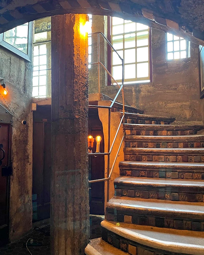 These tile-embedded stairs aren't just steps—they're a vertical museum where each riser displays Mercer's artistic vision. Watch your step while reading!