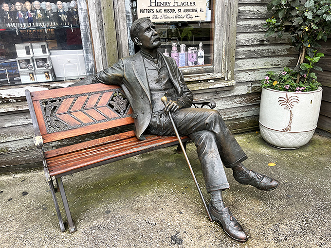Henry Flagler takes a permanent rest outside the museum, proving that even bronze needs to sit down after touring St. Augustine.