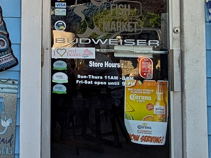 Store hours posted on the door &ndash; crucial information for planning your seafood pilgrimage to this Liberty landmark.