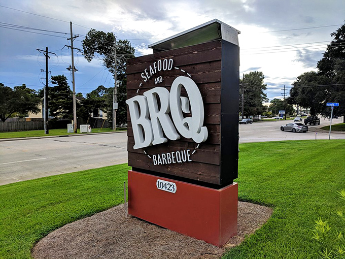 Bold signage announces this dual-threat establishment that refuses to choose between land and sea for your dining pleasure.
