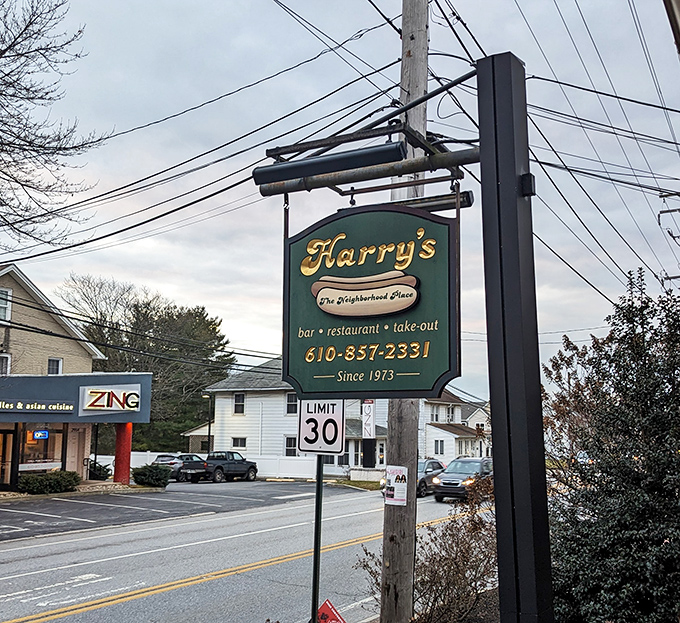 The sign says "The Neighborhood Place" &ndash; three words that perfectly capture what makes Harry's more than just somewhere to eat.