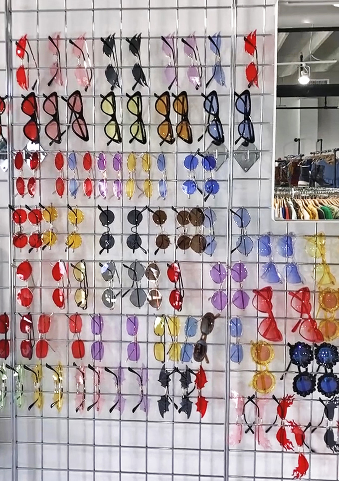 Sunglasses in every hue transform this display into a kaleidoscope of possibilities &ndash; each pair offering a different lens on your fashion future.