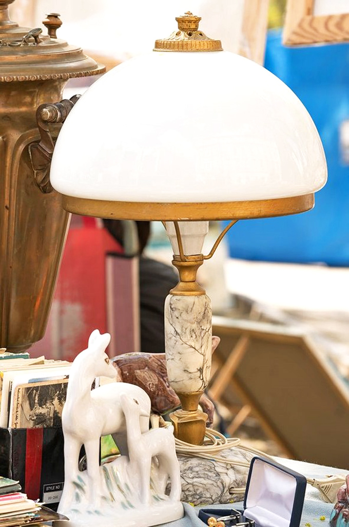 This elegant marble lamp once illuminated someone's cherished novels, and now waits patiently to cast its warm glow in a new home.