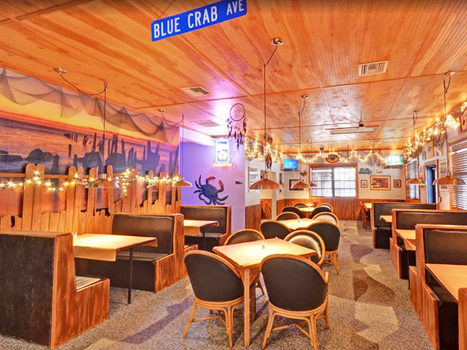Dining room or time machine to coastal comfort? Wood booths, fishing nets, and that "BLUE CRAB AVE" street sign transport you to a simpler, more delicious time.