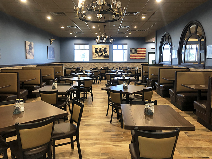 Spacious dining room with Western touches and an American flag, creating a welcoming atmosphere for families and friends alike.