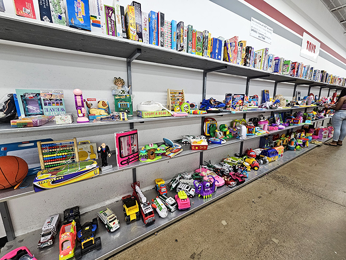 Toy nirvana! From board games to model cars, childhood memories line these shelves. That yellow NASCAR might race right into someone's collection today.