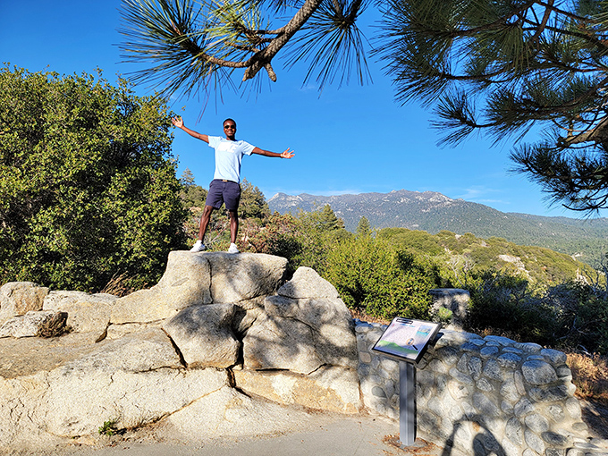 Victory stance achieved! When the view is this spectacular, you can't help but throw your arms wide and channel your inner Leonardo DiCaprio on the Titanic.