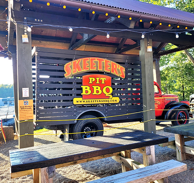 The smoking pit where the magic happens&mdash;a vintage truck transformed into BBQ headquarters, proving that the best kitchens sometimes have wheels.