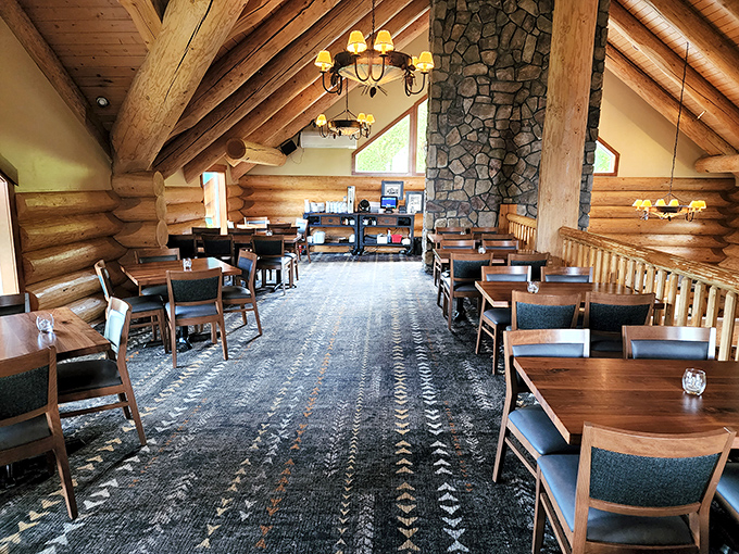 Dining room or cathedral of cuisine? Those soaring ceilings and stone fireplace create a space worthy of gastronomic worship.