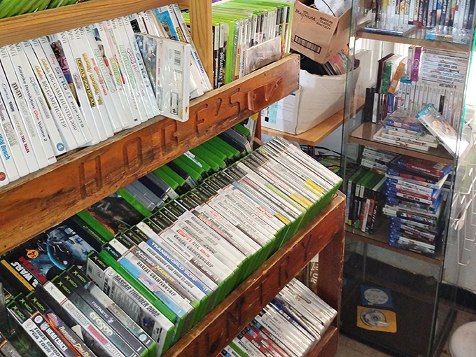 Video game paradise where yesterday's cutting-edge technology awaits nostalgic players. Someone's about to rediscover their misspent youth one cartridge at a time.