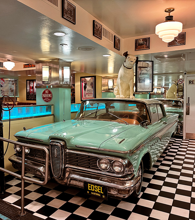 Not just decoration&mdash;this mint-green Edsel is automotive royalty holding court in the diner, silently judging your dessert choices.