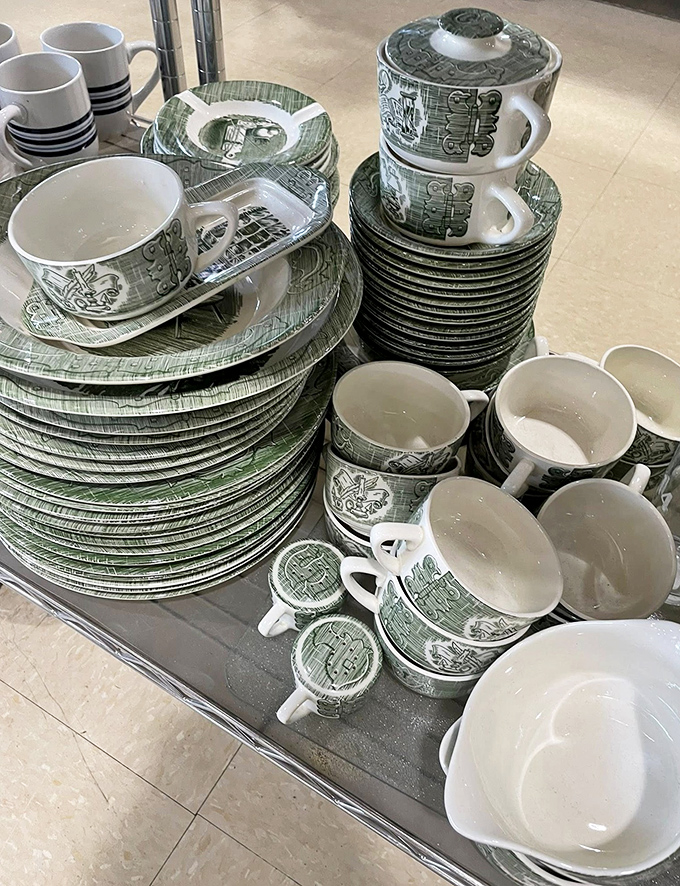 A complete set of vintage green patterned dinnerware—the kind grandma served holiday meals on—miraculously intact and reunion-ready.