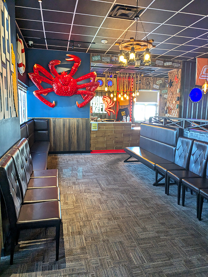 The waiting area features sleek seating and a giant red crab that seems to say, "Trust me, the wait is worth it."