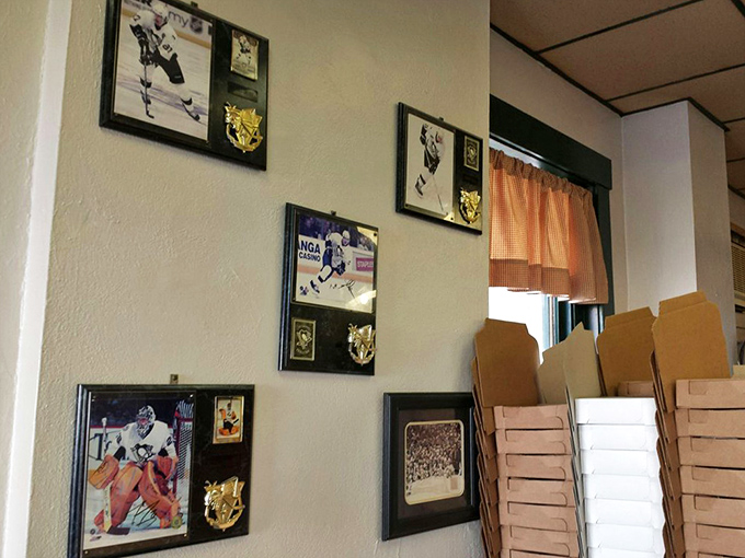 Sports memorabilia adorns the walls &ndash; a reminder that in Western Pennsylvania, local loyalty extends to both teams and pizza.