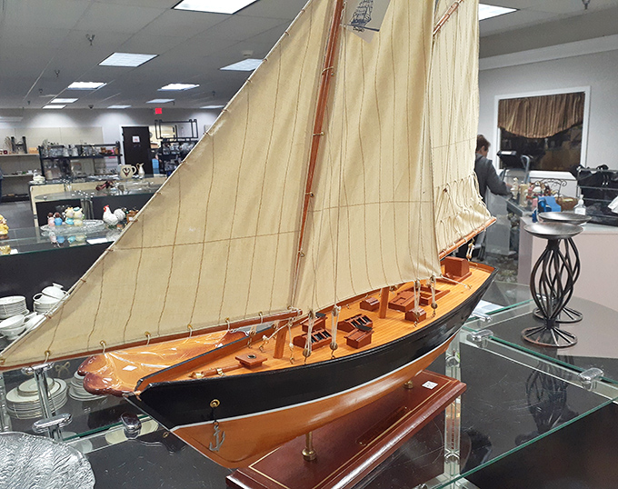 That model sailboat isn't just decor &ndash; it's someone's miniature voyage to adventure, now docked at a bargain price.