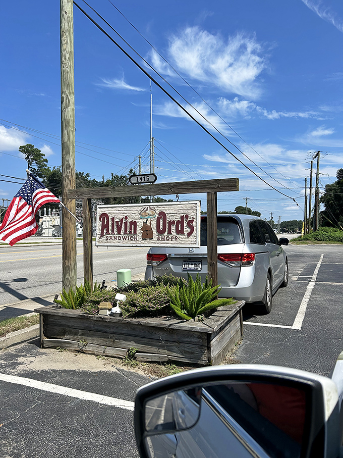 Alvin Ord's rustic wooden sign and American flag create the perfect backdrop for sandwich patriotism.