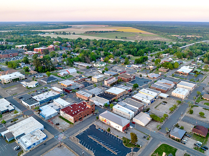 A peaceful aerial view of Arkadelphia highlights its welcoming downtown, tree-lined streets, and the charm of small-town Arkansas life.