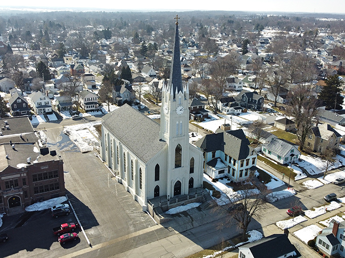 Huntington's church spire reaches skyward, much like how your retirement savings will stretch in this budget-friendly community.