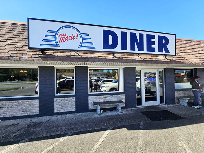 Marie's Diner's classic signage and brick facade have been welcoming hungry patrons for generations.