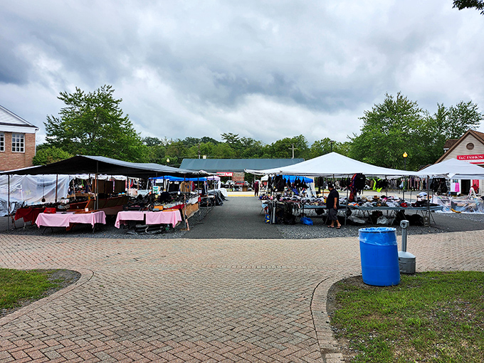 Market day memories in the making. Families and collectors mingle along brick pathways lined with vendor tables at this Poconos institution.