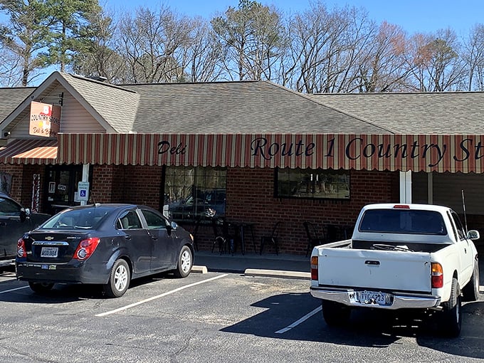 Route 1 Country Store proves great sandwiches hide in unexpected places. That striped awning signals delicious detours ahead.