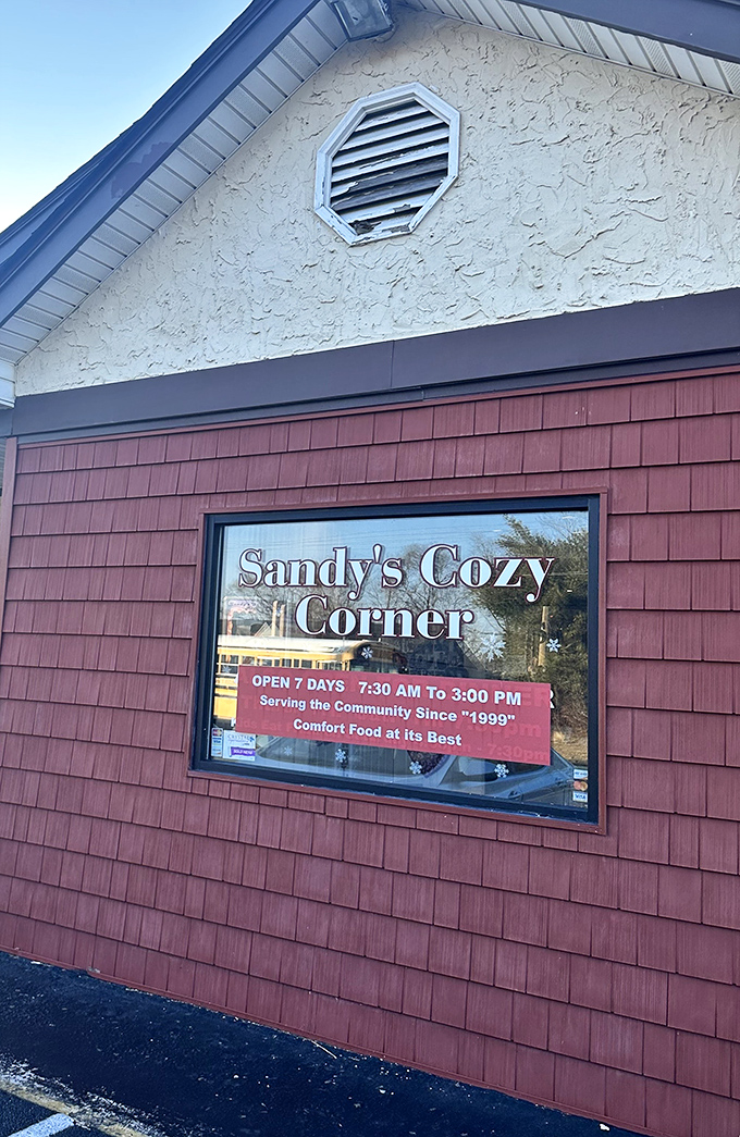 This cozy cottage-style building with weathered shingles whispers promises of homestyle cooking and genuine hospitality inside.