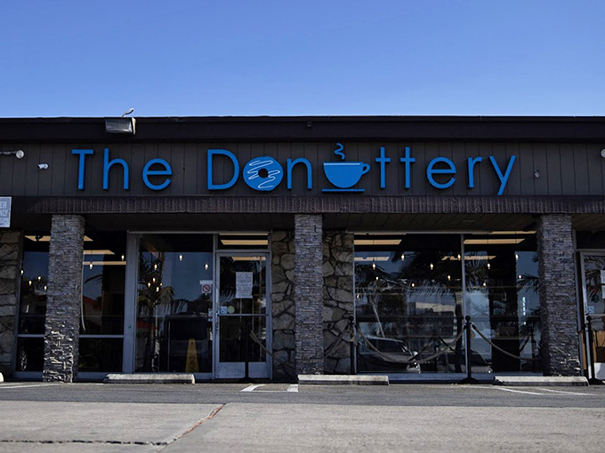 The Donuttery's sleek stone facade hides a wonderland of creative flavors waiting to be discovered.