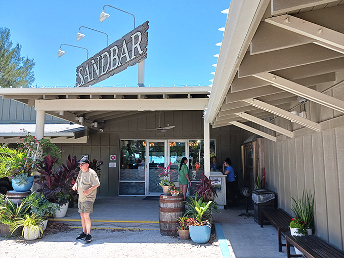 The Sandbar's pristine white building matches the sugar-sand beaches that made this coast famous.