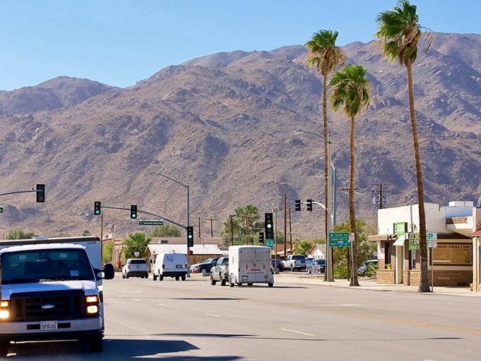 Twentynine Palms' main drag stretches toward distant mountains, offering desert beauty at prices that won't leave you parched.