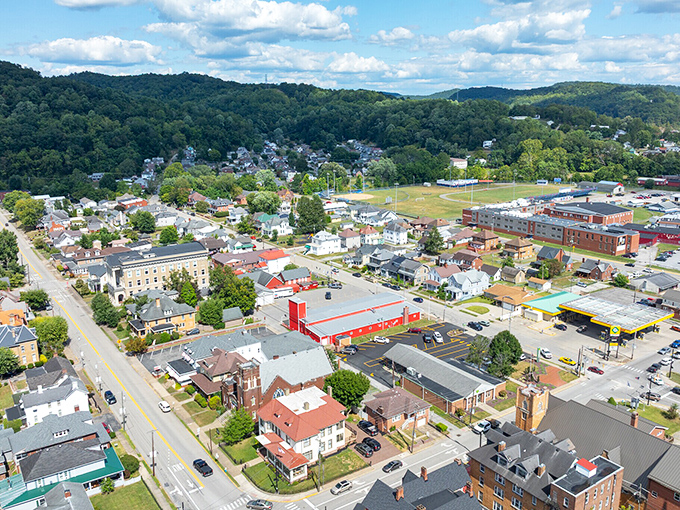 Valley of value, version Weston! This aerial view reveals a hidden menu of affordable housing options nestled between forest-covered hills.