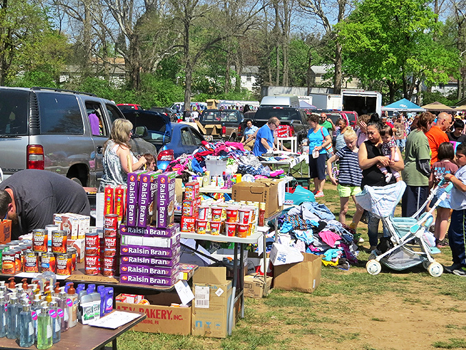 Raisin Bran bonanza! Boxes of cereal and household goods create a grocery store atmosphere at this outdoor community shopping event.