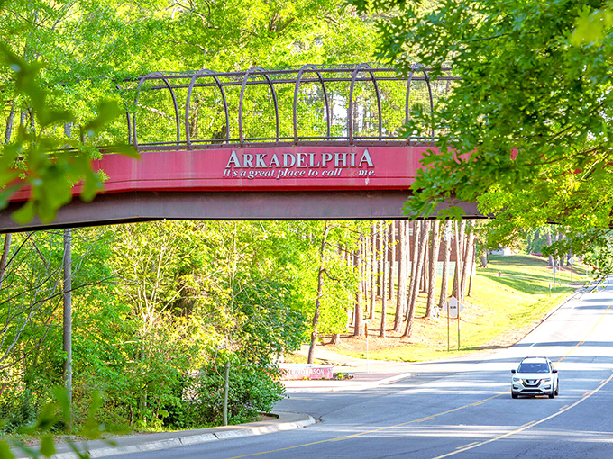 Sunlight filters through the trees as you enter welcoming Arkadelphia, Arkansas, a peaceful small town filled with charm and community warmth.