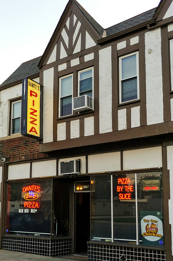 Those glowing neon signs in Dante's windows are like pizza bat-signals, calling hungry Clevelanders to crispy, cheesy salvation.