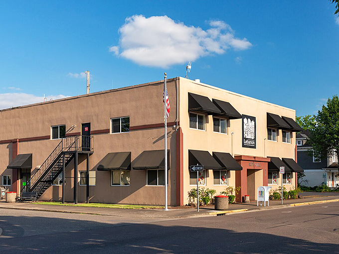 This modest Lebanon building with its practical awnings and American flag represents small-town values where your retirement dollars thrive.