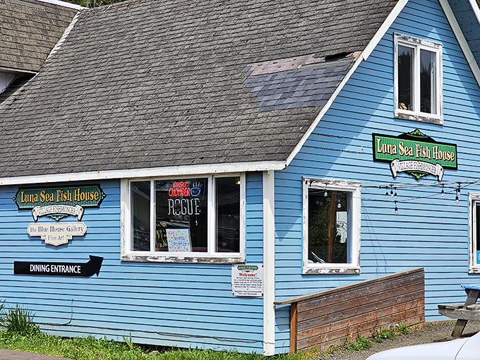 The cheerful blue siding of Luna Sea Fish House stands out against Yachats' often gray coastal skies.