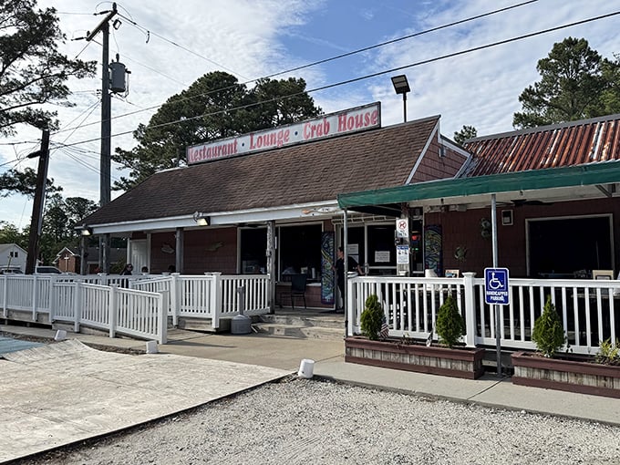 American flags flutter outside this unassuming spot where seafood recipes have been perfected over decades.