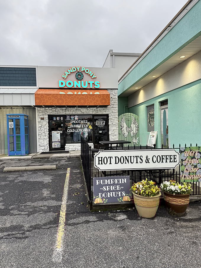 Turquoise accents and stone facade create the perfect backdrop for hot, fresh donuts by the sea.