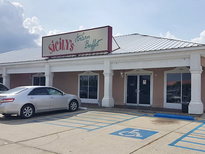 This peaceful facade hides generous buffets where every dish whispers stories of authentic Italian family cooking traditions.