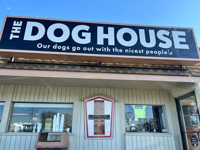 That cheerful sign promises the kind of honest food that makes any journey worthwhile.