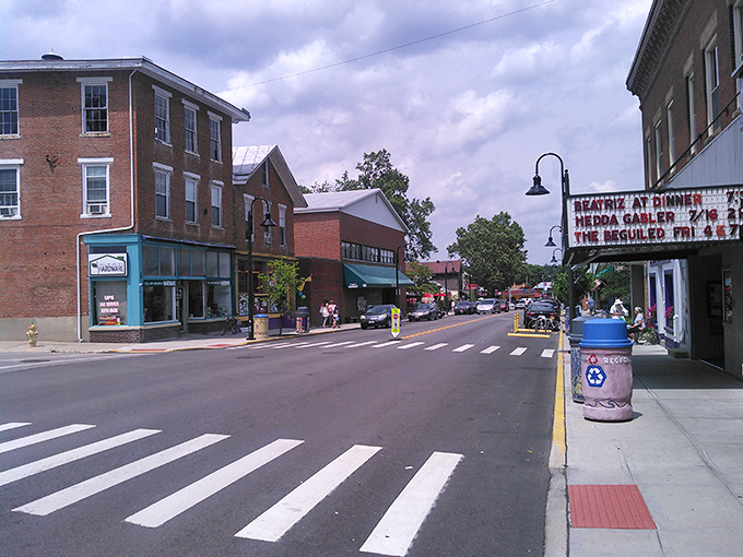 Yellow Springs' walkable downtown means saving on gas while enjoying small-town treasures. The theater marquee promises affordable entertainment!