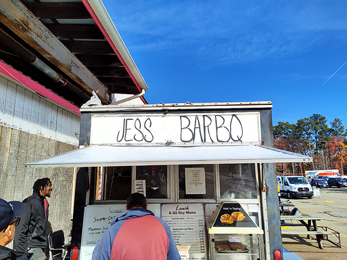 "Jess BarBQ" serves up smoky sustenance for serious shoppers. Because nothing fuels bargain hunting like a pulled pork sandwich on a paper plate.