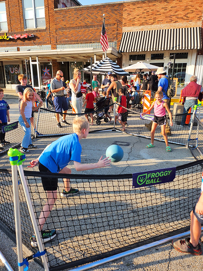 Community comes alive during Lincoln's street festivals, where games like "Froggy Ball" transform downtown into a playground for the young and young-at-heart.