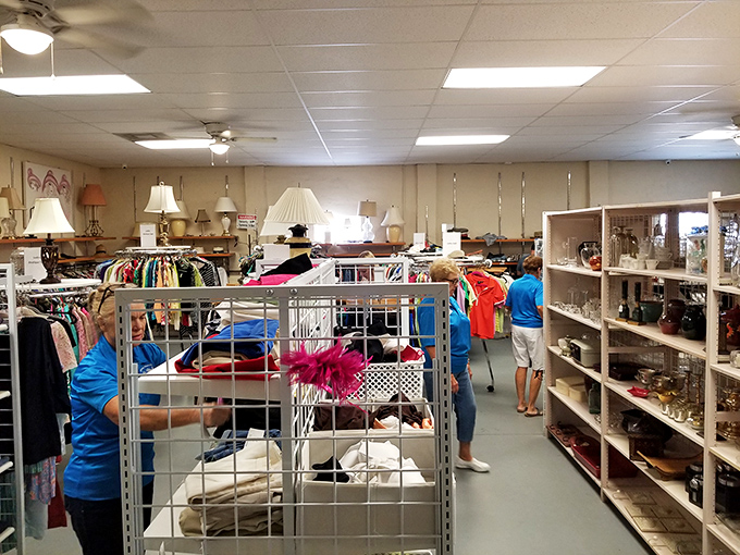 The store layout invites exploration, with treasures around every corner. That shopper in blue has the focused look of someone who's found the motherlode.
