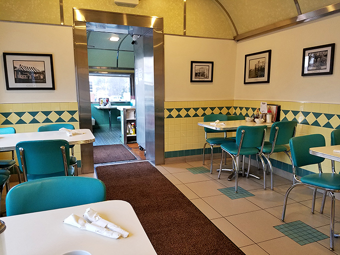 The diamond pattern tile work and turquoise chairs aren't just design choices—they're a time machine to when diners were America's great democratic eating establishments.
