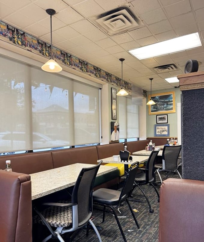 Brown vinyl booths line the walls beneath racing memorabilia, creating the perfect pit stop for hungry Indianapolis breakfast enthusiasts.