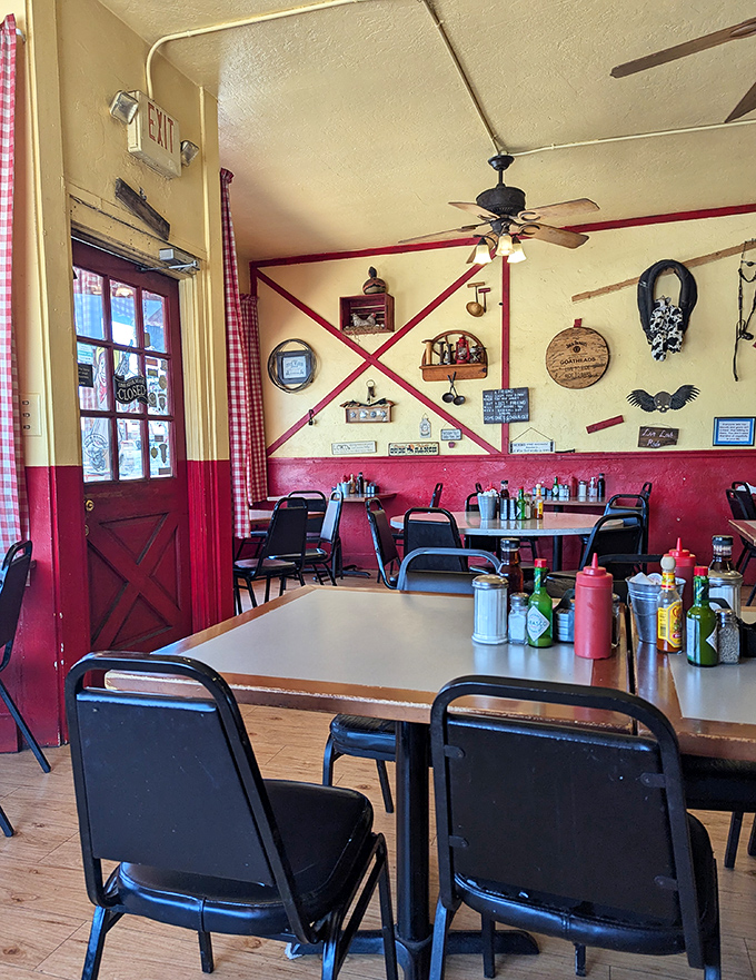 Red and cream walls adorned with Western knick-knacks create the perfect backdrop for breakfast decisions that will impact your entire day.