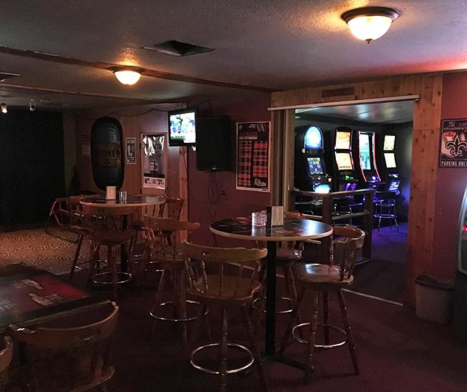 Another angle reveals the gaming area just beyond the dining room &ndash; because good food and entertainment are natural companions.